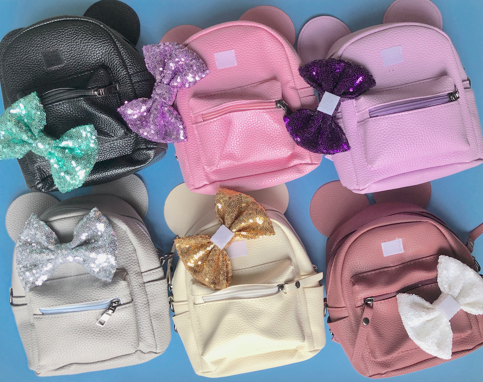 These Interchangeable Bow Minnie Backpacks Make Accessorizing A Breeze ...
