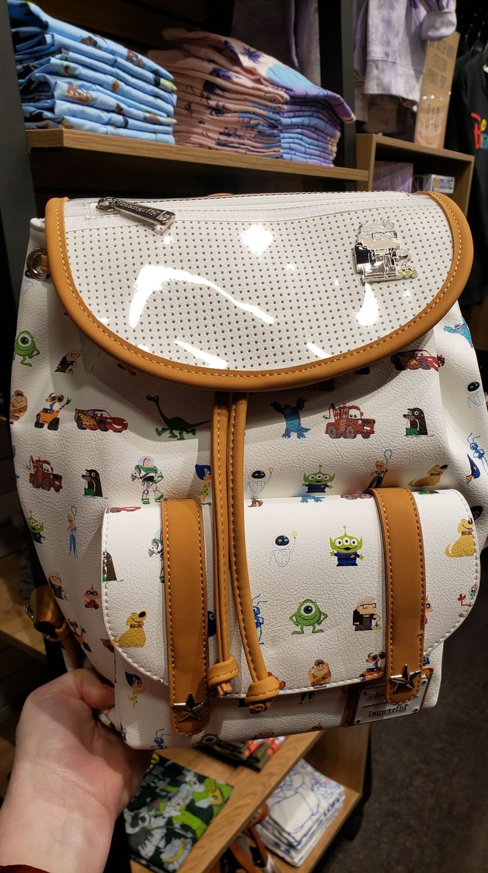 This Pixar Pin Collector Mini Rucksack Is A Pin Collector's Dream Bag ...