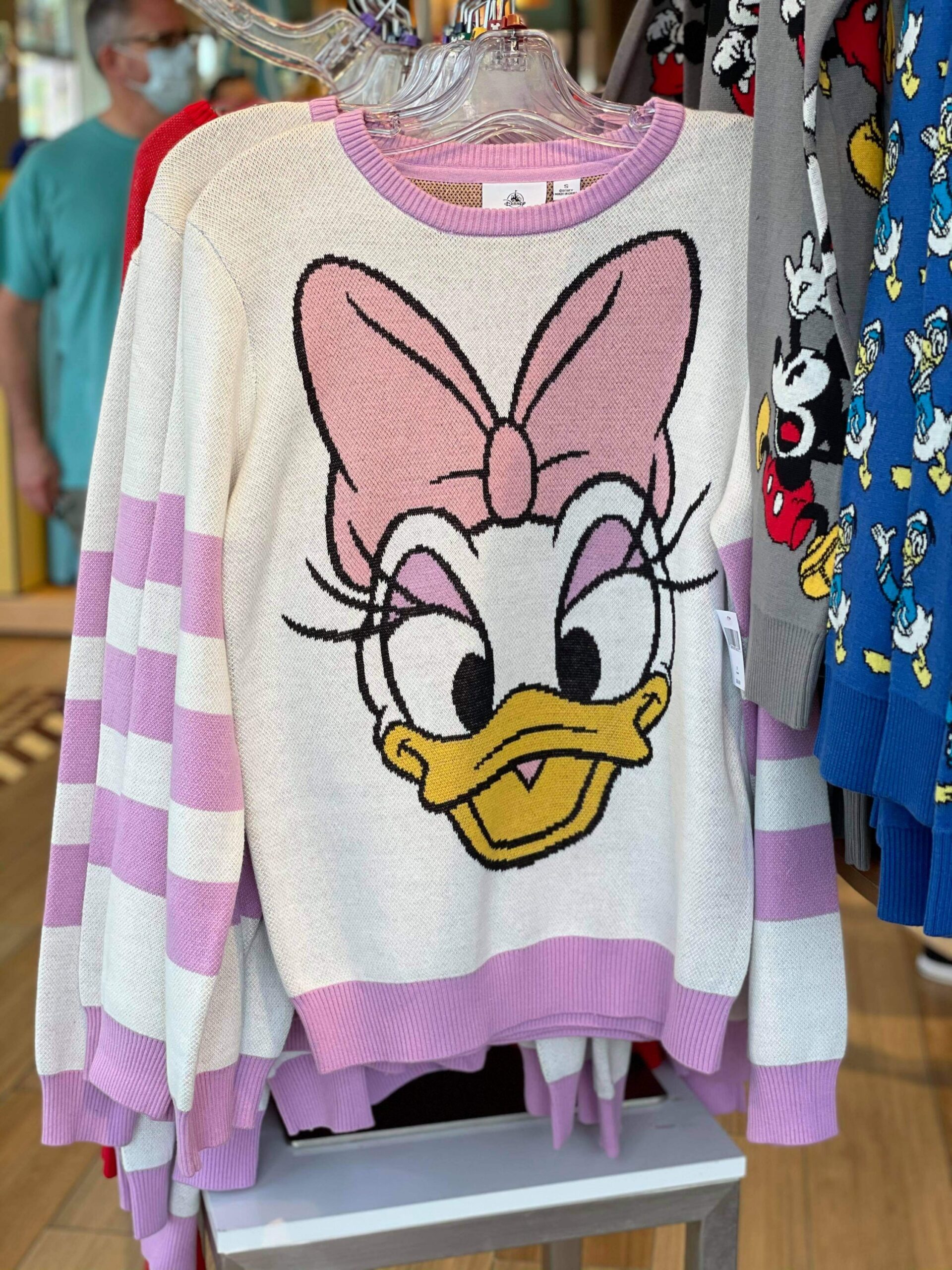 Add a Pop of Color to Your Winter Wardrobe With These Disney Sweaters