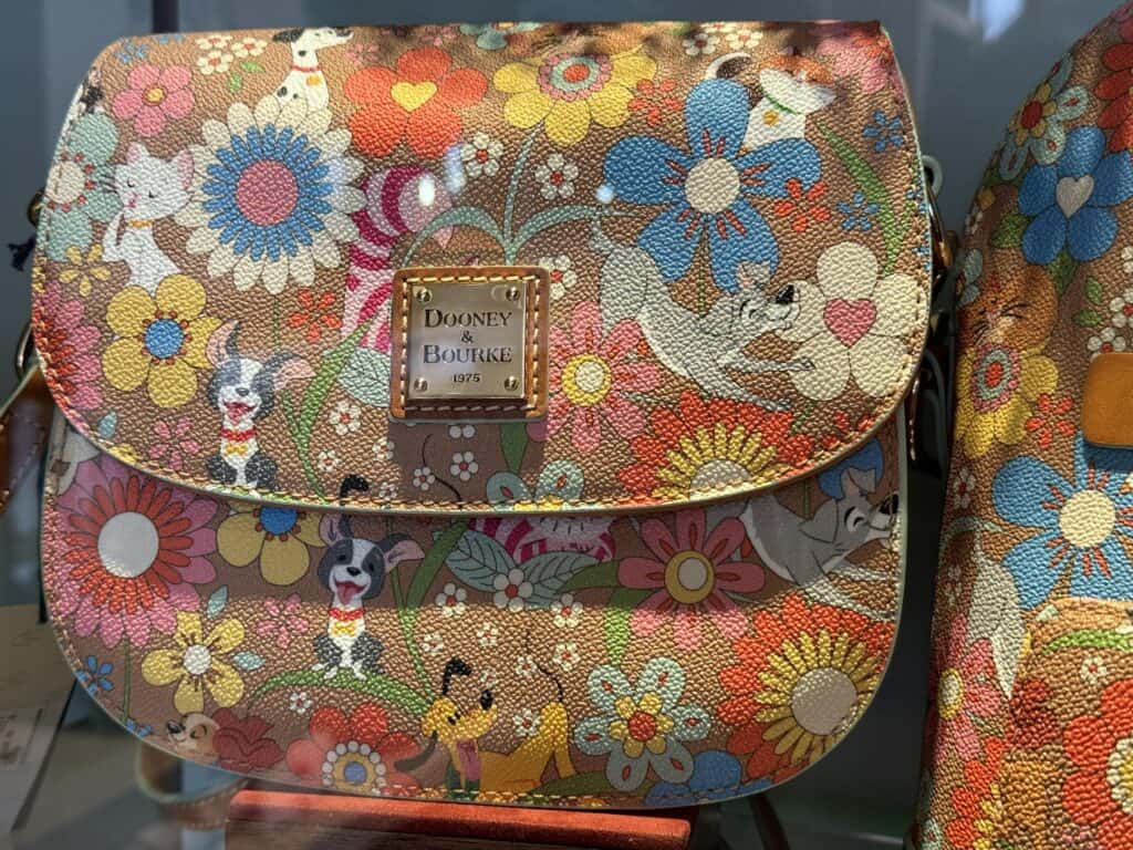 Take A Look At The Groovy Disney Pets Dooney & Bourke Collection! - bags